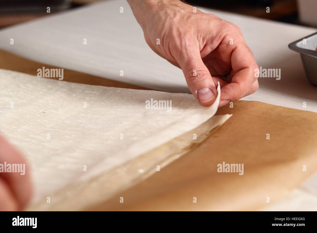 Stacking filo pastry sheet. Making Filo Pastry Topped Apple Pie Series ...