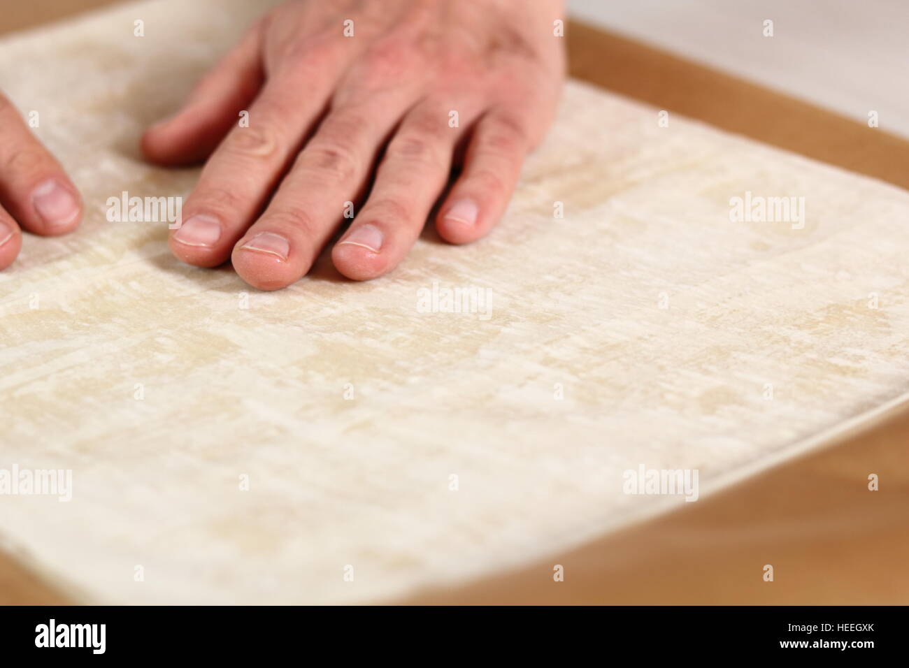Stacking filo pastry sheet. Making Filo Pastry Topped Apple Pie Series ...