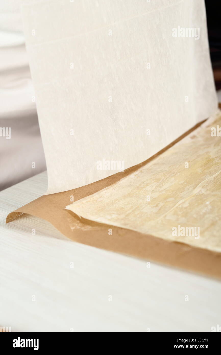 Stacking filo pastry sheet. Making Filo Pastry Topped Apple Pie Series ...