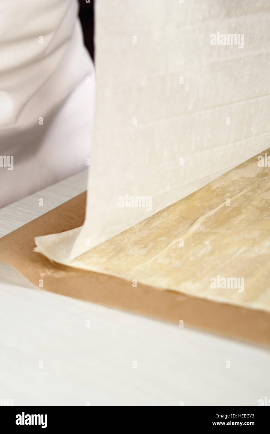 Stacking filo pastry sheet. Making Filo Pastry Topped Apple Pie Series ...