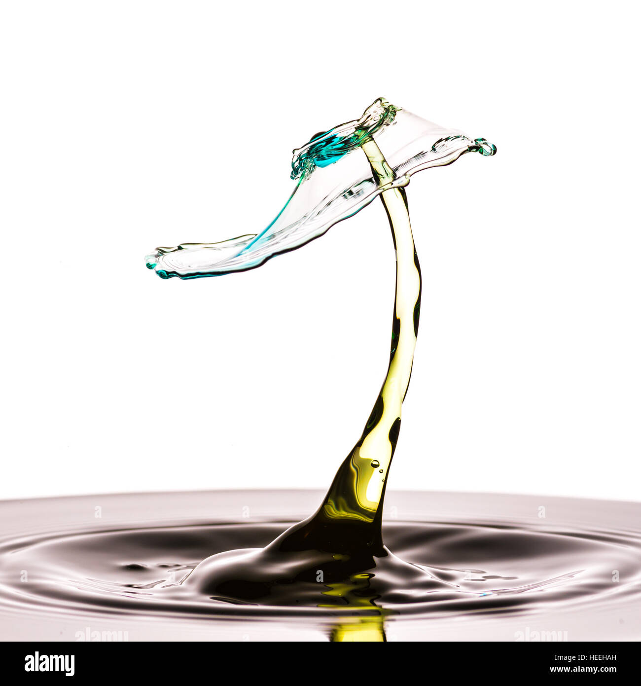 Water droplets colliding captured using high speed flash technique ...