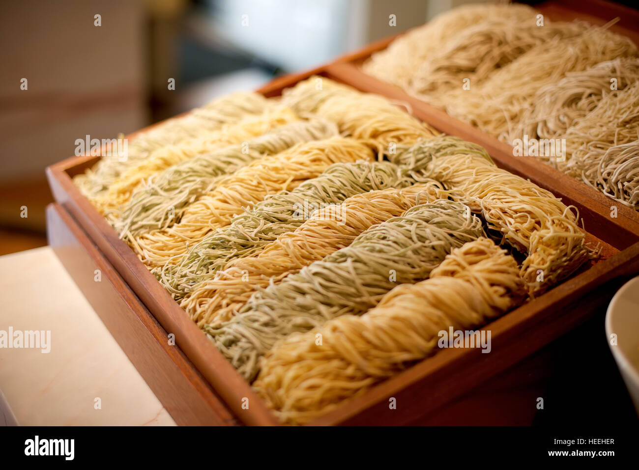 Raw spinach egg noodles hi-res stock photography and images - Alamy
