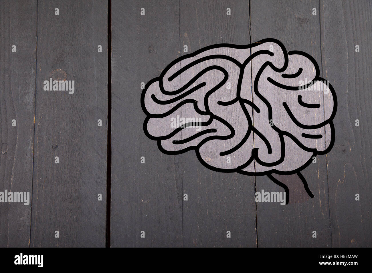 Illustration of a brain on wooden background Stock Photo - Alamy