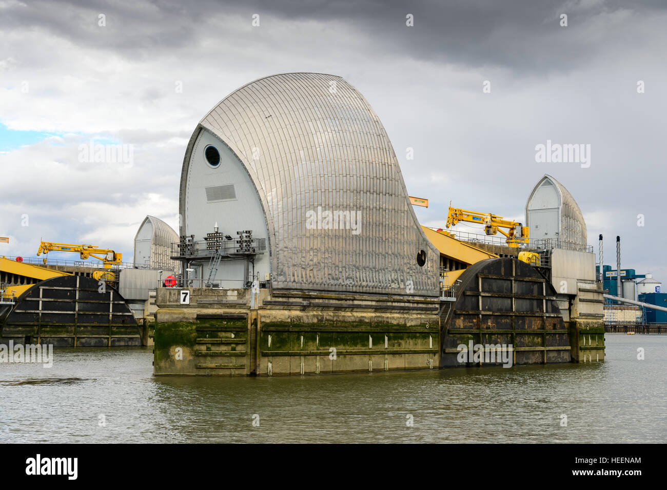 One of the rotating gates of the Thames Flood Barrier that spans the ...