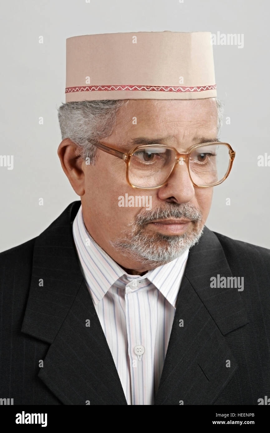A portrait of typical Maharashtrian gentleman in traditional outfit ...