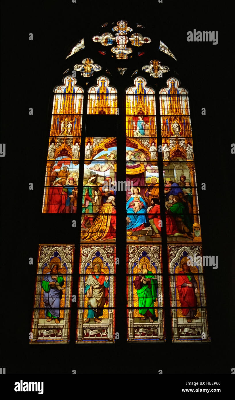 Stained glass window with pictures of Christian saints Stock Photo - Alamy