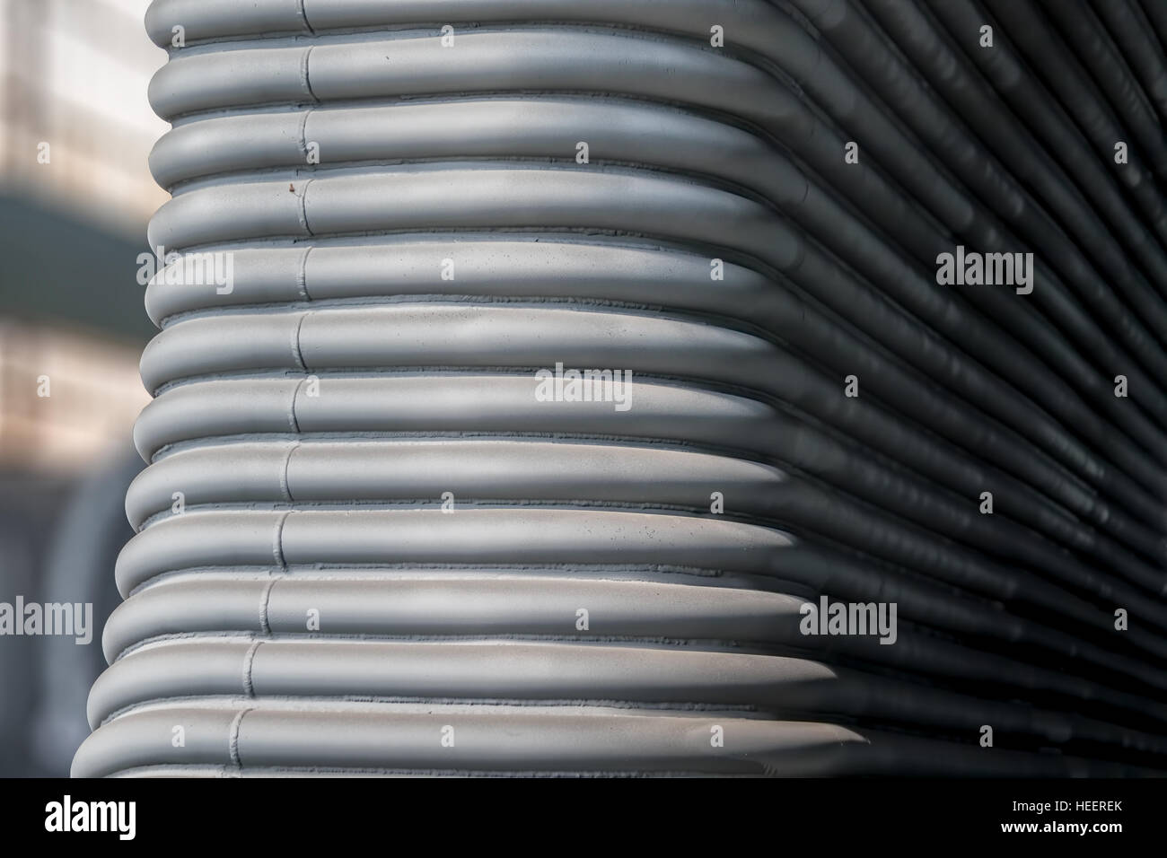 Metal pipes background Stock Photo - Alamy
