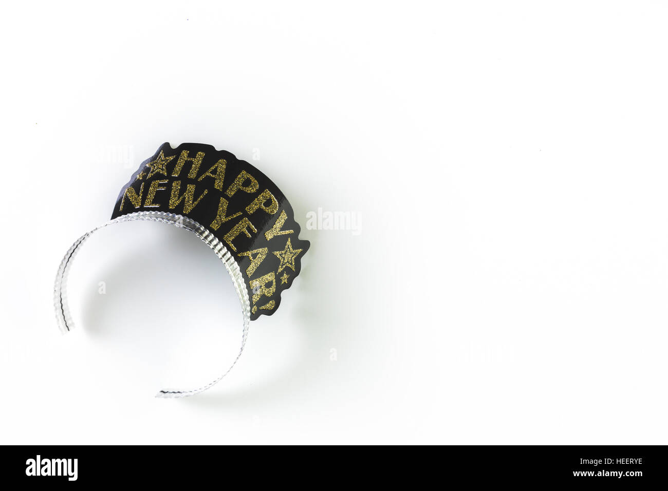 New Year Eve party crown on a white background Stock Photo - Alamy