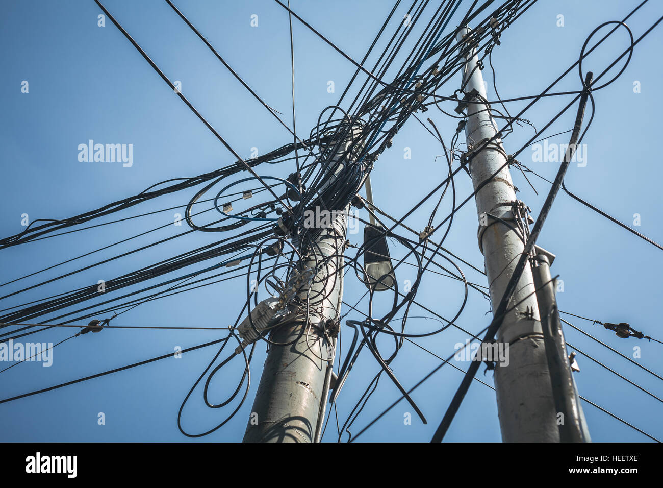 A tangle of cables and wires in Bucharest, Romania, Europe Stock Photo ...