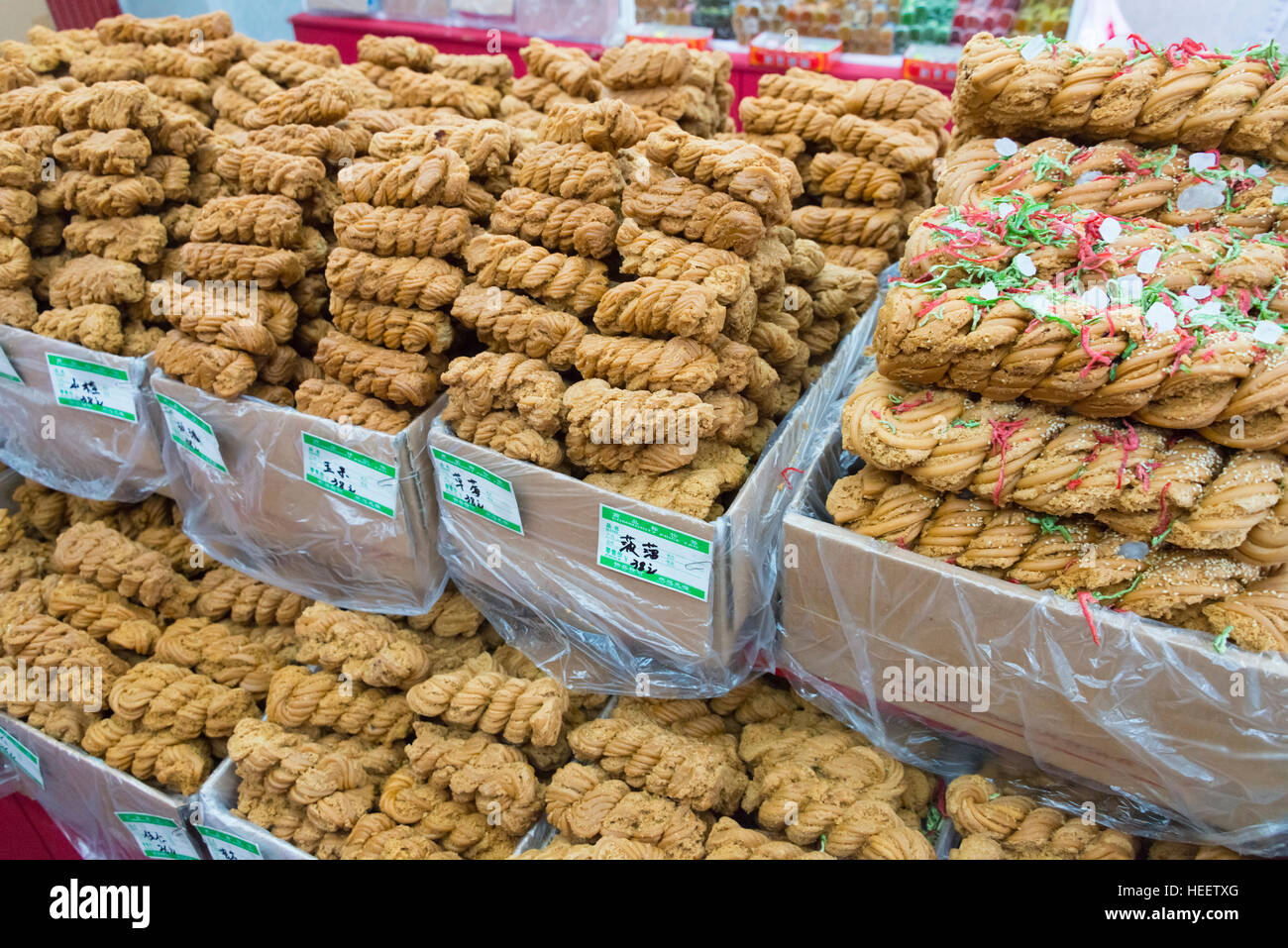 Famous local snack food, Mahua (slightly-crispy fried-dough curler ...