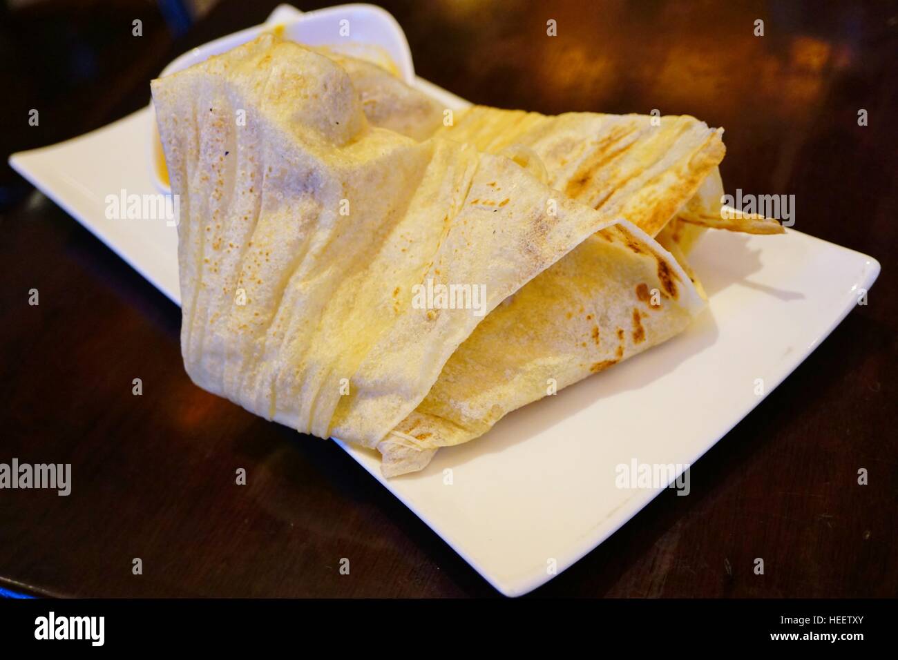 Layered paratha flatbread called Roti Canai in Malaysia Stock Photo - Alamy