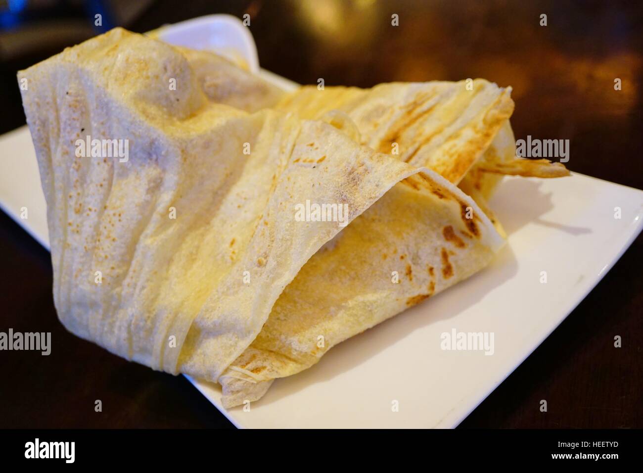 Layered paratha flatbread called Roti Canai in Malaysia Stock Photo - Alamy
