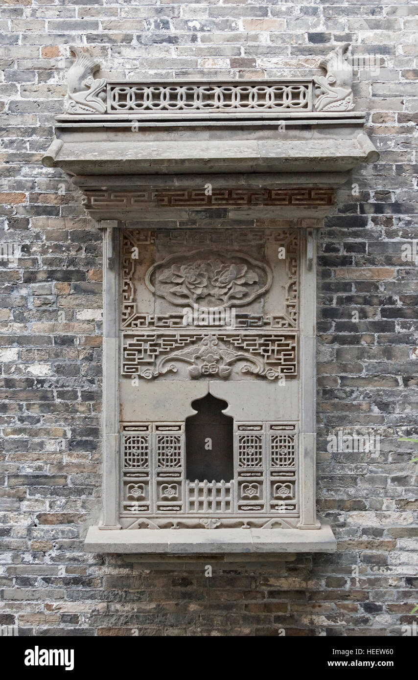 Decoration on the brick wall of a traditional house, Yangzhou, Jiangsu ...