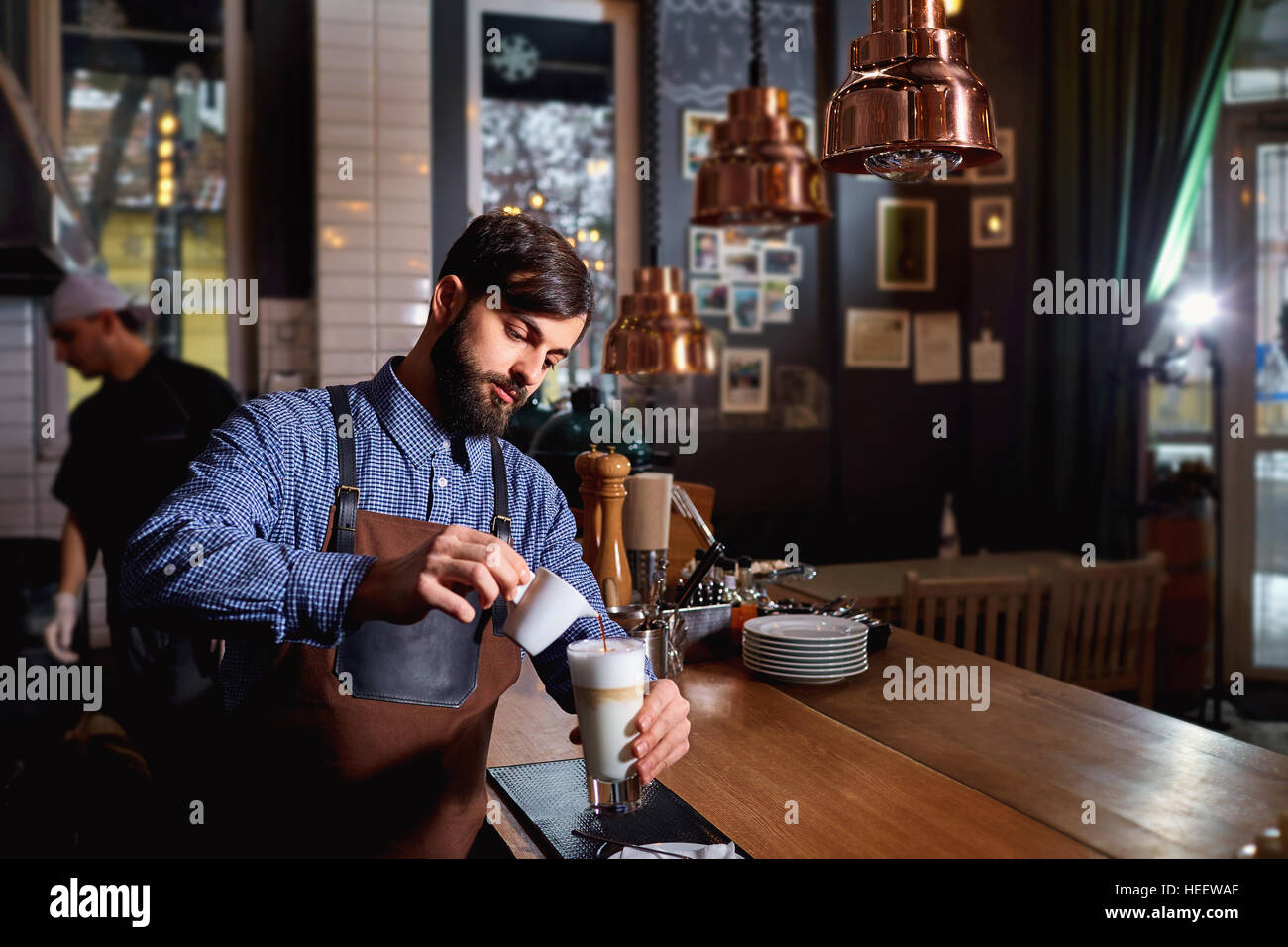 Barista making cocktails hi-res stock photography and images - Alamy
