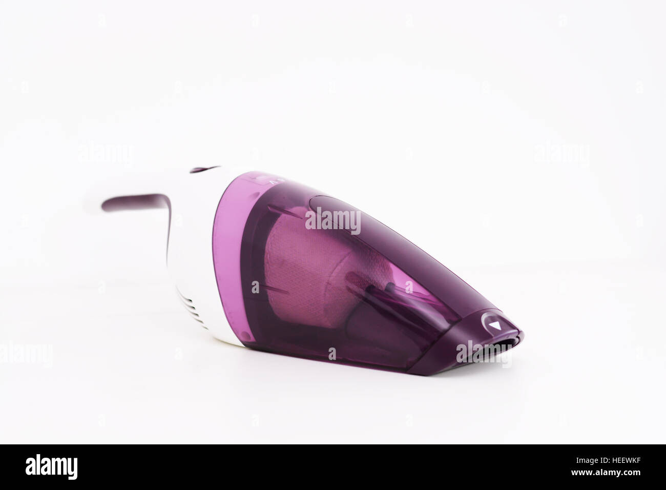 Isolated purple hand held vacuum cleaner Stock Photo - Alamy