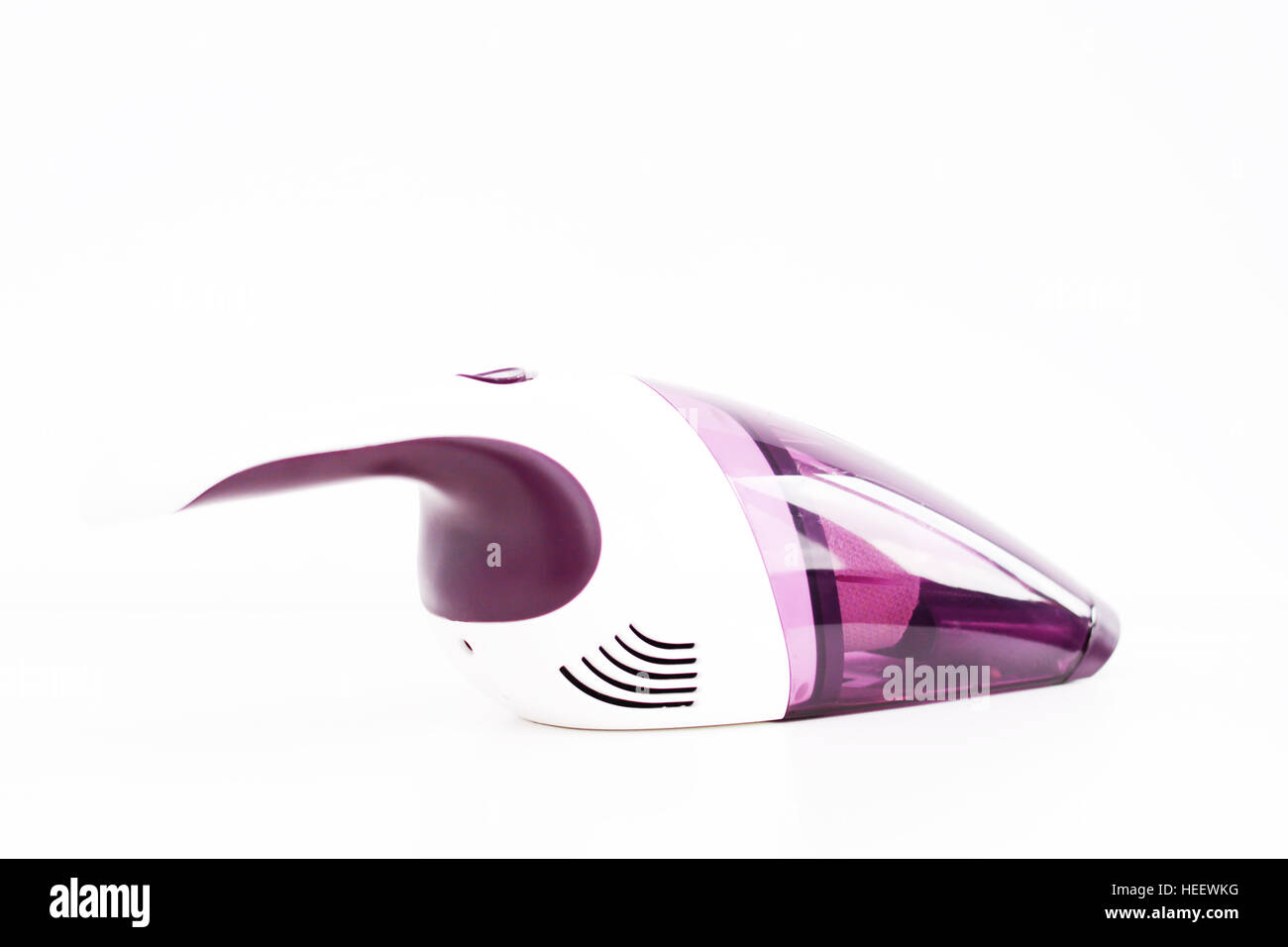 Isolated purple hand held vacuum cleaner Stock Photo - Alamy