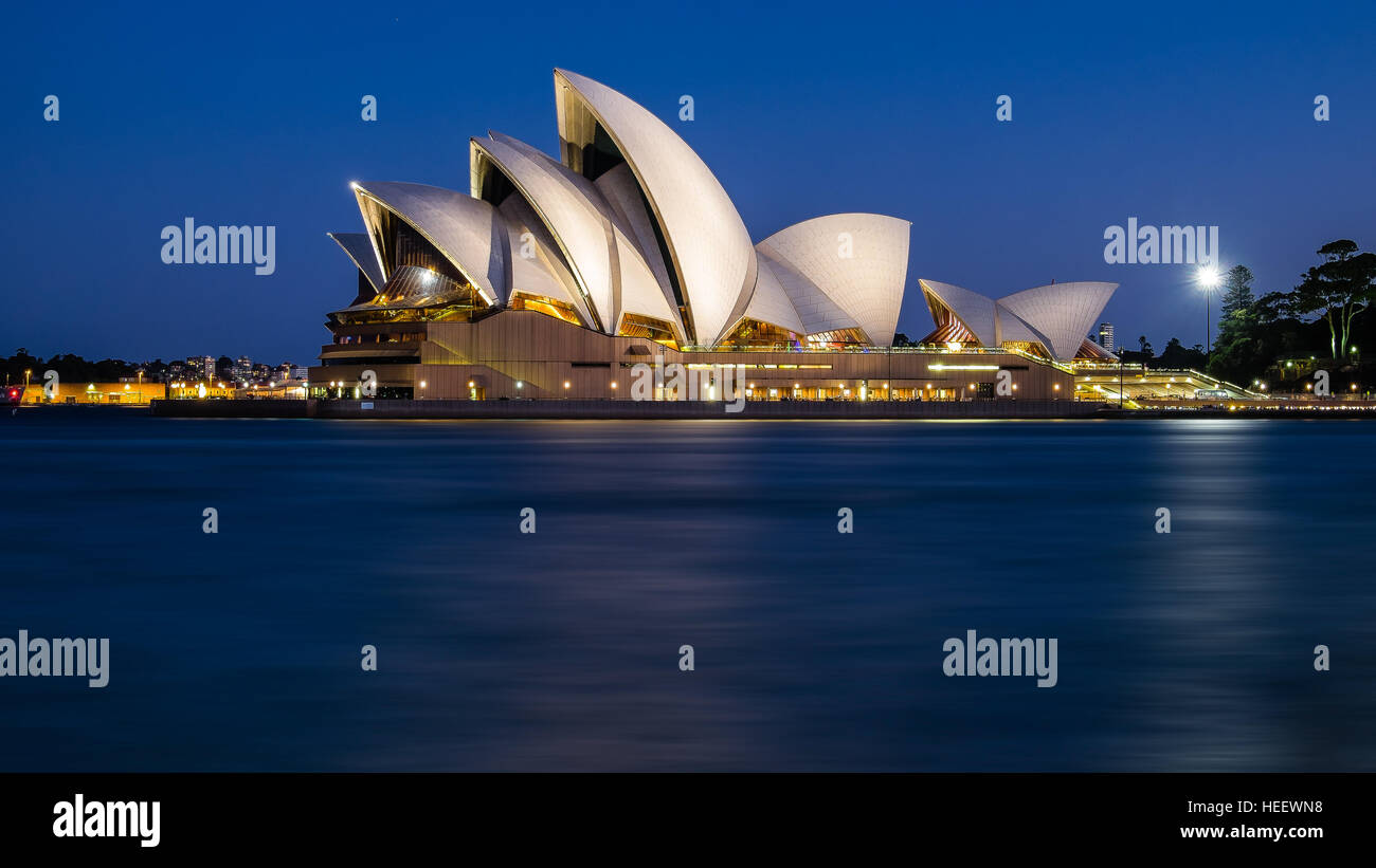 Beautiful Opera House of Sydney shining like a diamond in the evening ...