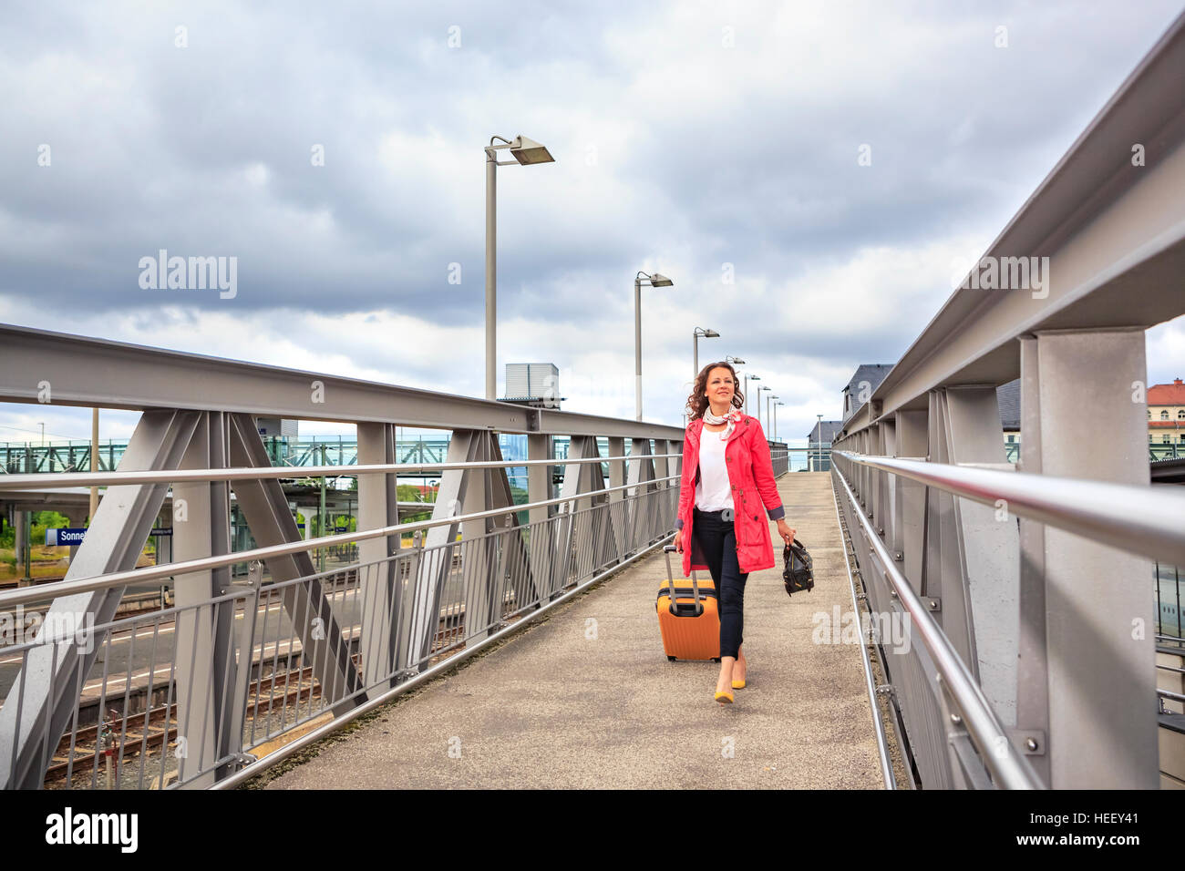 Young woman bus station hi-res stock photography and images - Alamy