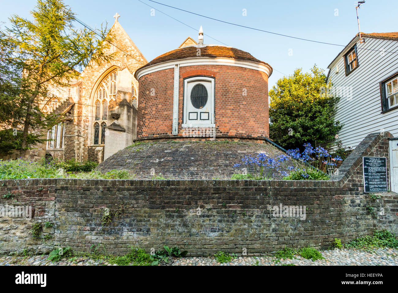 The oval brick tower, built 1733, Grade II listed building, containing ...