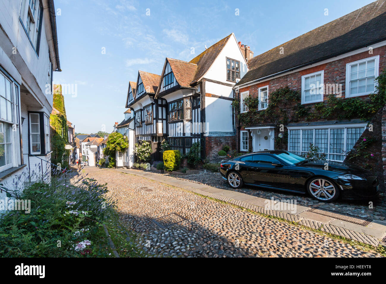 English historical town of Rye. View along cobblestone street with15th ...