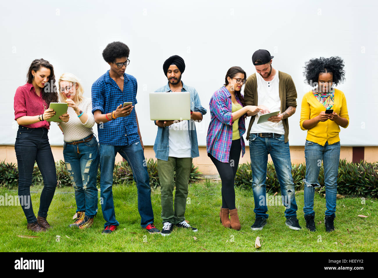 College Students Using Digital Devices Concept Stock Photo - Alamy
