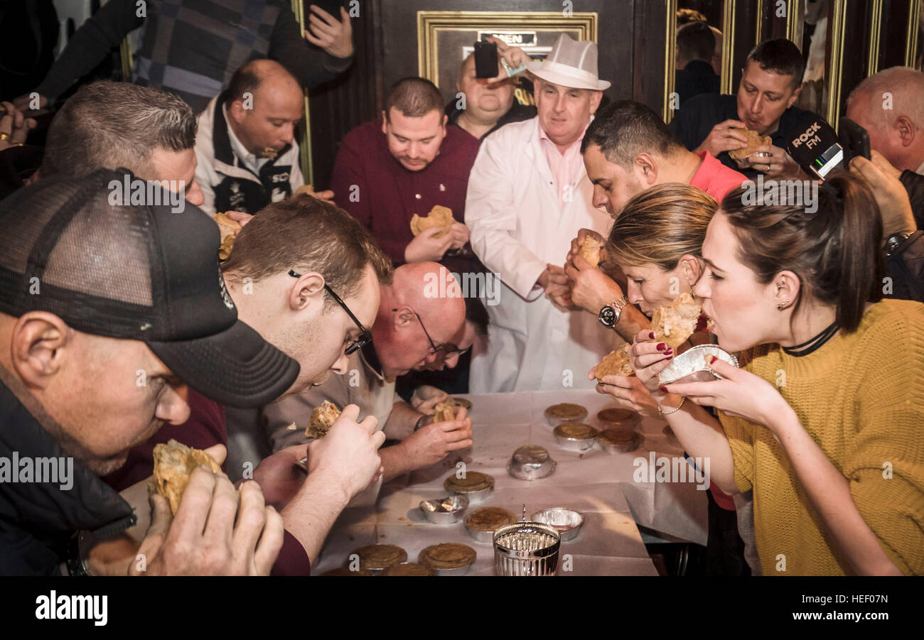 Competitors take part in the World Pie Eating Championships in Wigan ...