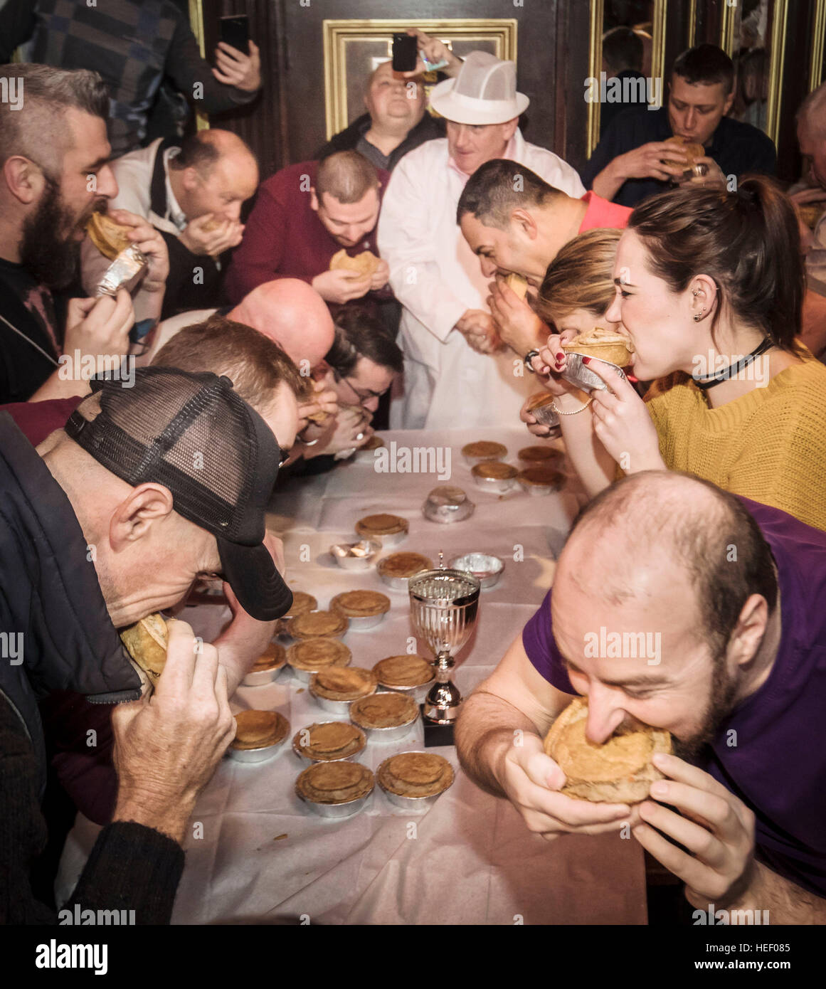Competitors take part in the World Pie Eating Championships in Wigan ...