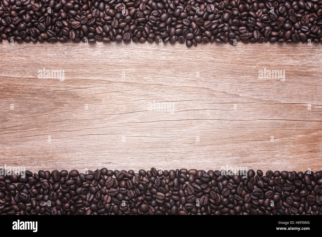 Close up coffee beans on wooden background, Composition with free space ...