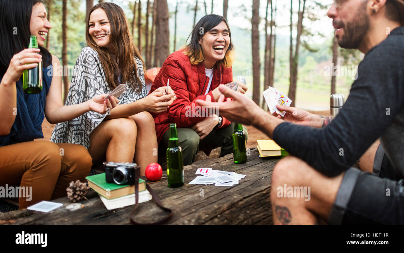Friends Camping Playing Cards Concept Stock Photo - Alamy