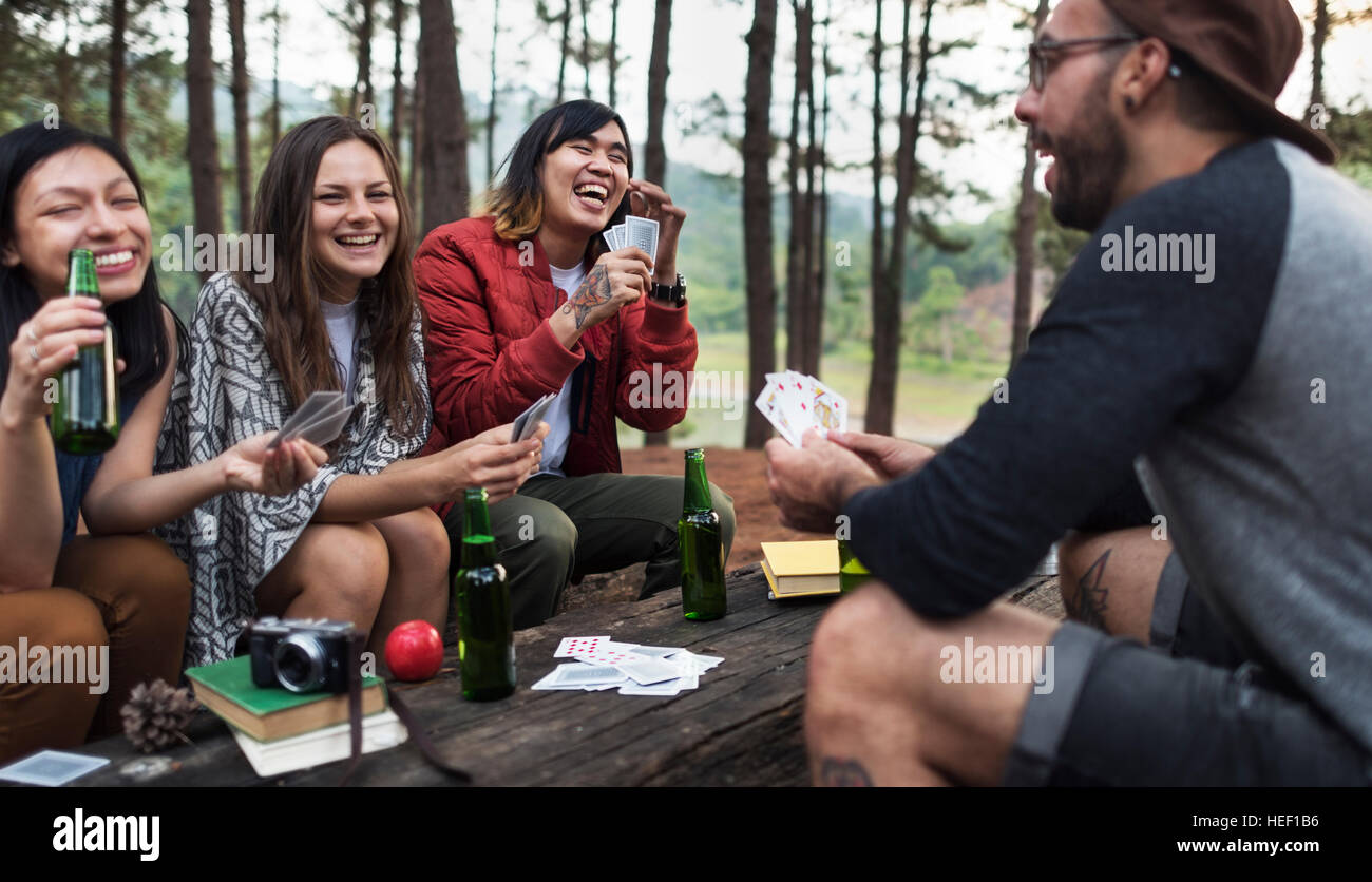 Friends Camping Playing Cards Concept Stock Photo - Alamy