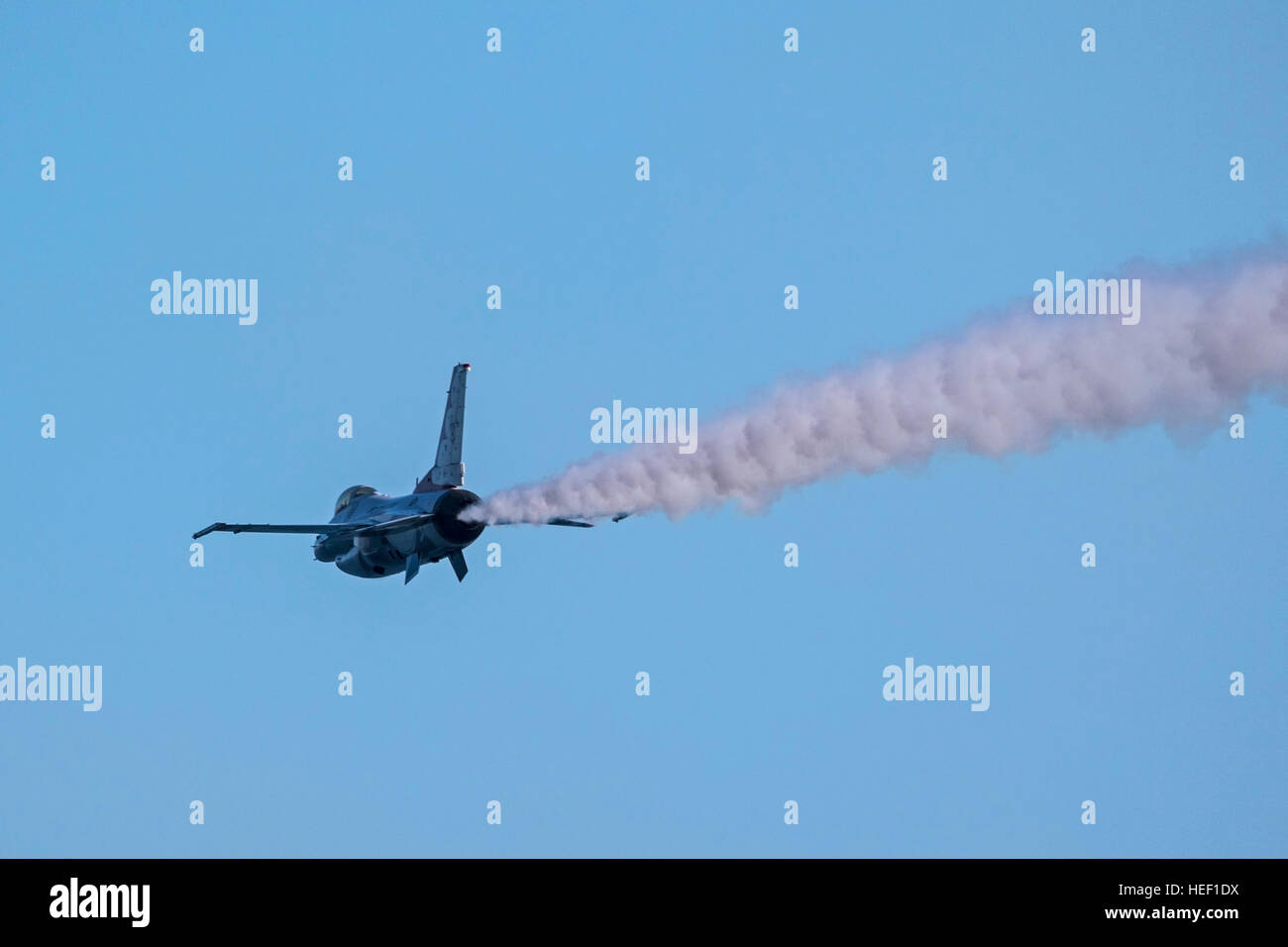 Airplane US Air Force Thunderbirds F-16 jet fighter tail engine glow ...