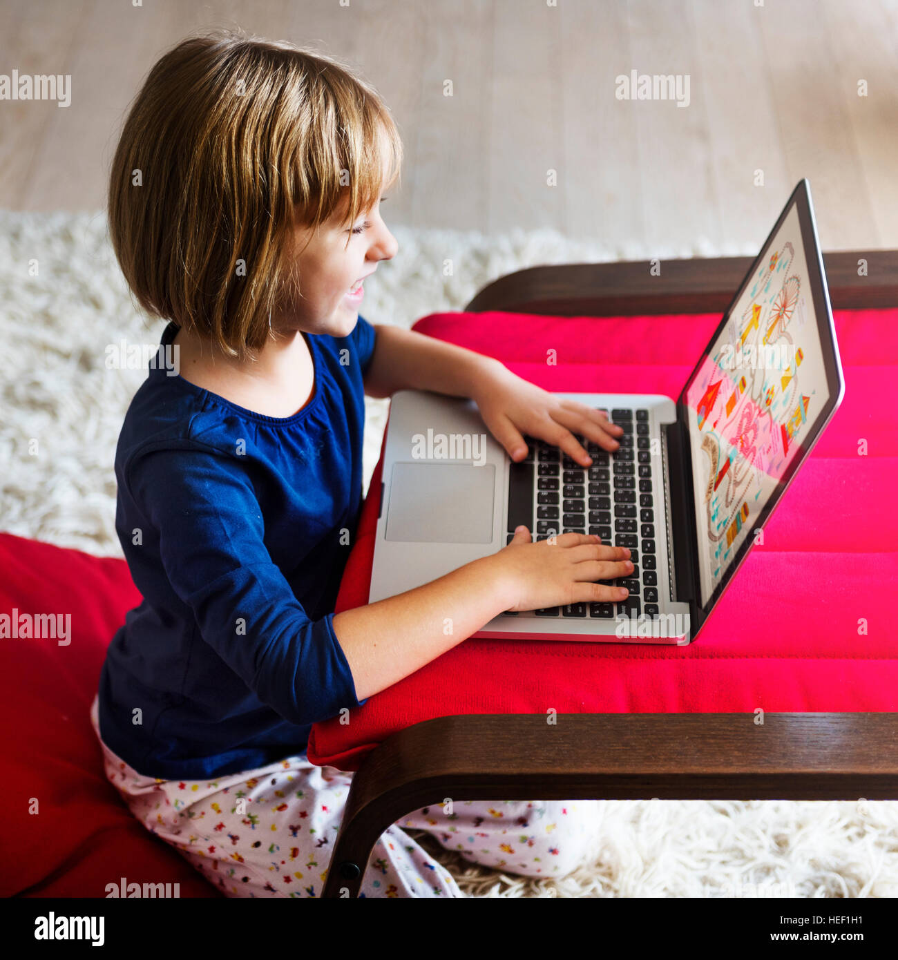 Little Girl Using Device Concept Stock Photo - Alamy