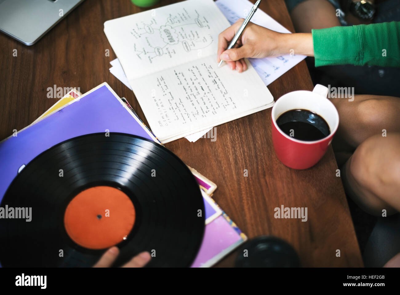 Human Hand Writing Notebook Vinyl Record Music Concept Stock Photo - Alamy