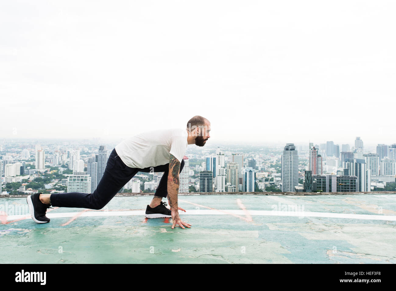 Man Exercise Workout Rooftop Concept Stock Photo - Alamy