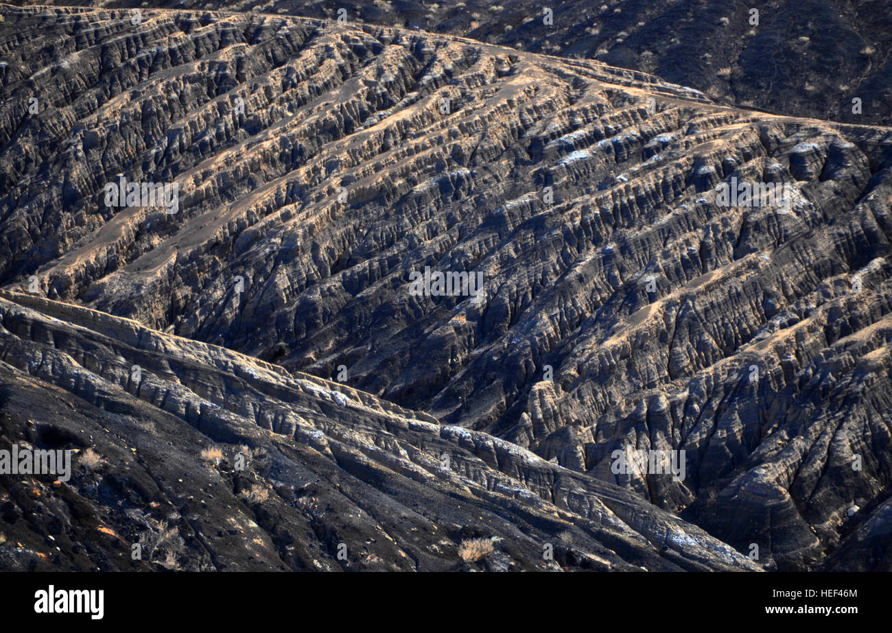 Water-eroded gullies formed in cinders on the flank of the Ubehebe ...