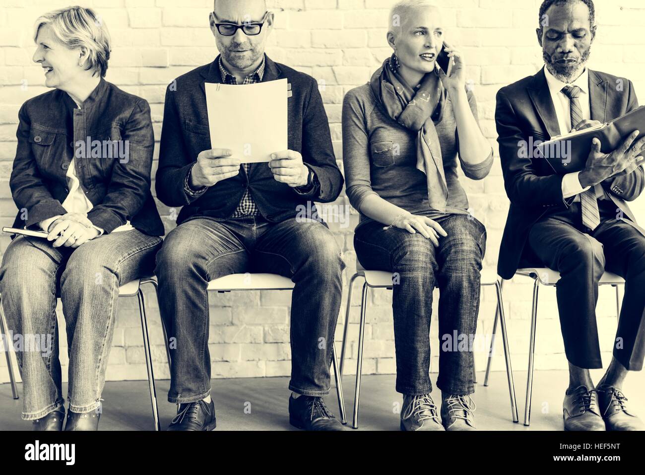 Diverse Group of People Community Sitting Waiting Concept Stock Photo ...