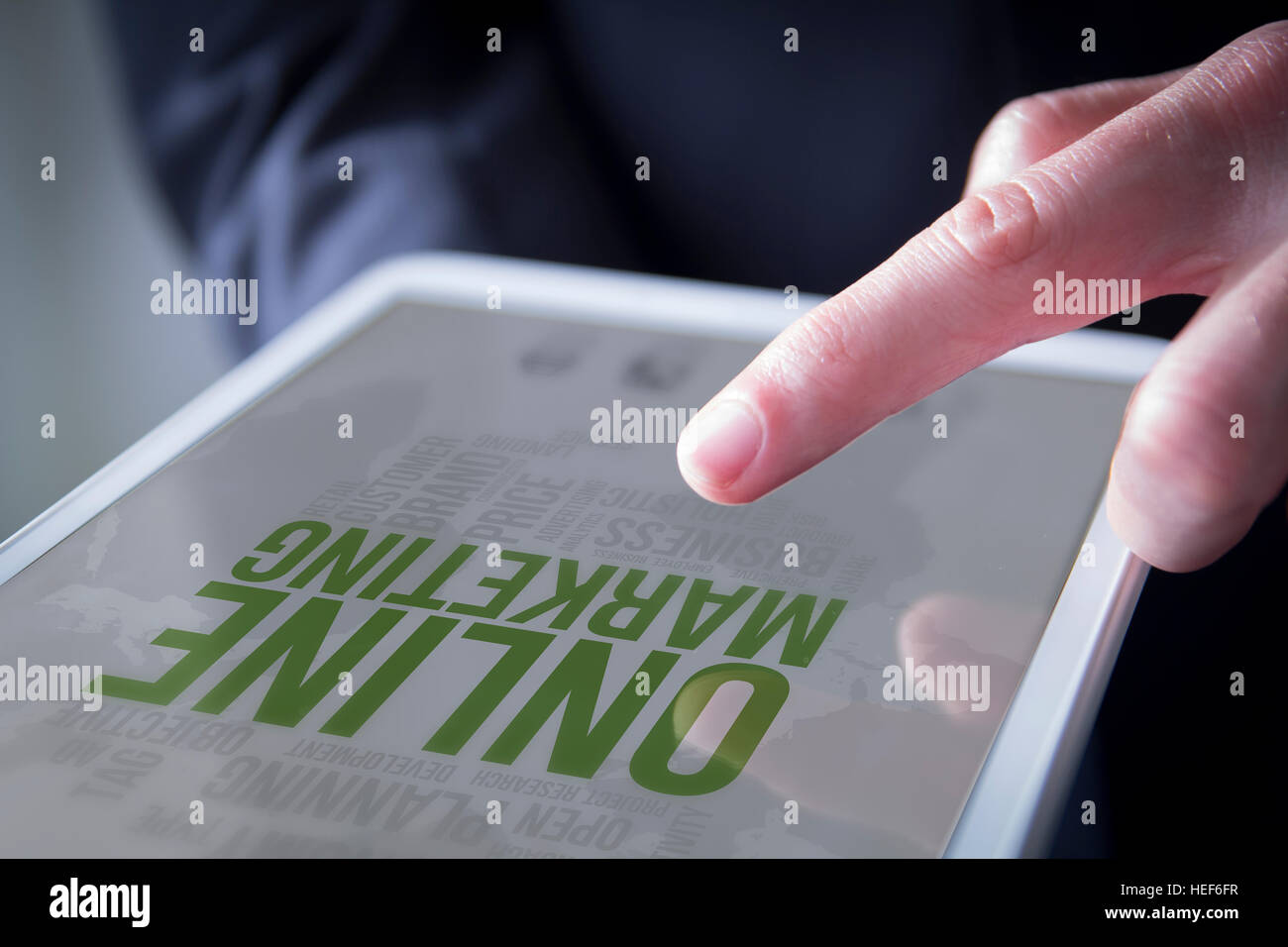 finger touches digital tablet showing online marketingon screen Stock ...