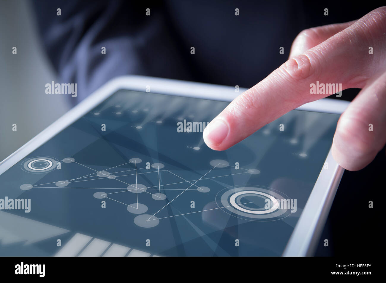 finger touches digital tablet showing graphics on screen Stock Photo ...