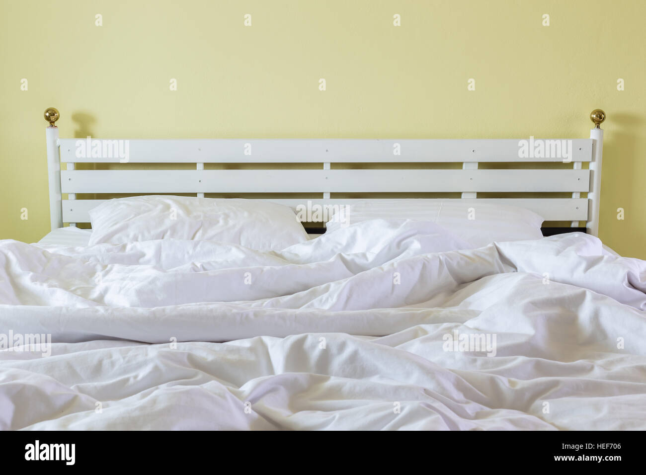 Close up white bedding sheets and pillow, Messy bed concept Stock Photo ...