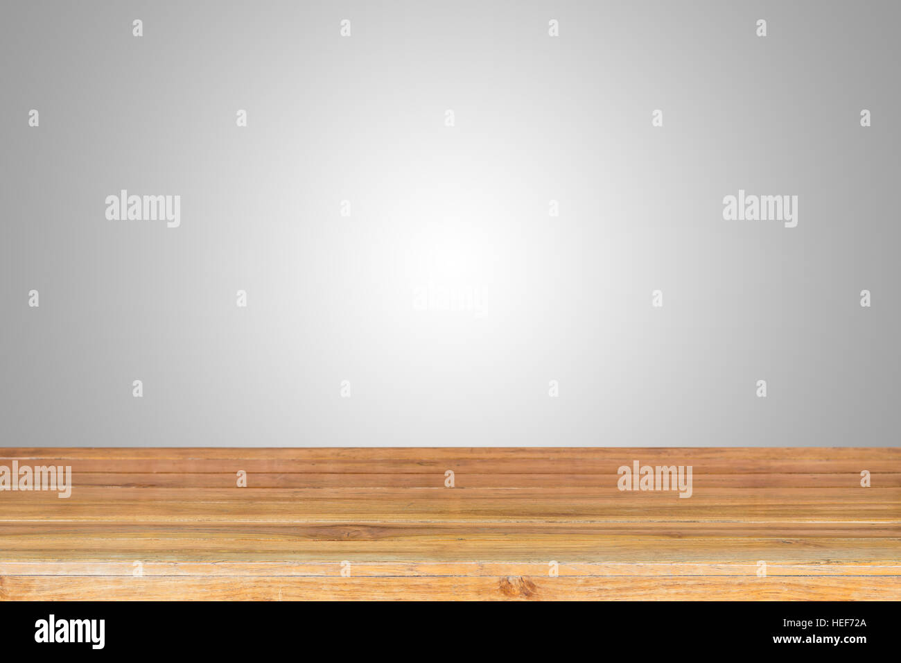 Empty top of wooden table or counter isolated on white background. For ...