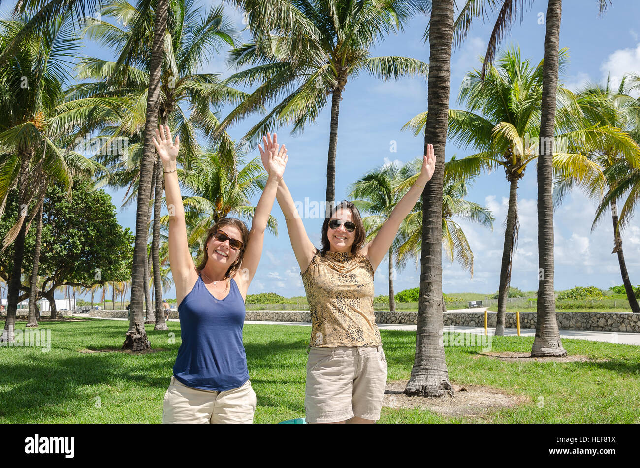Miami, USA - October 5, 2012: Tourist enjoying Miami Beach with Palm ...