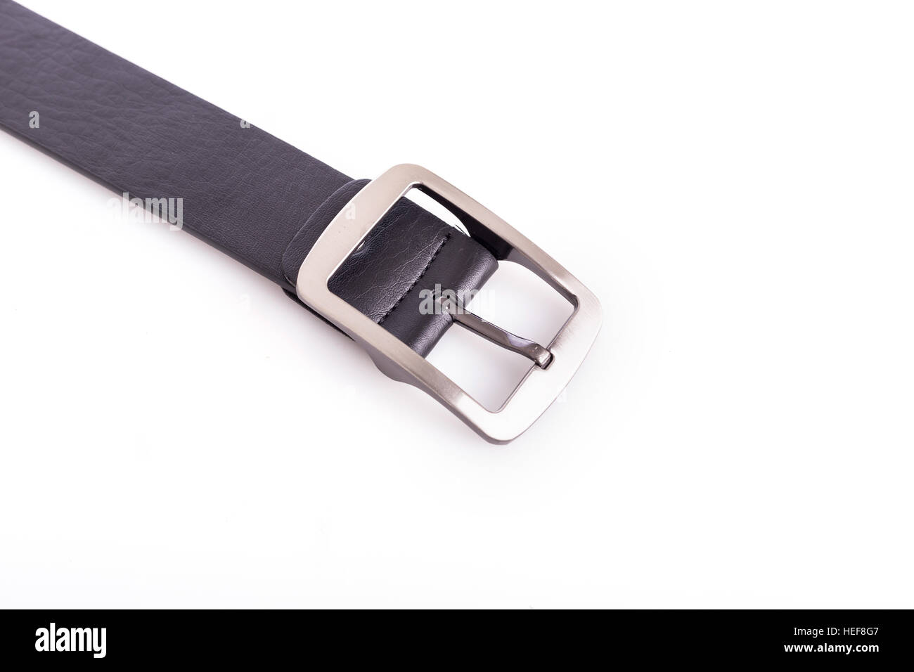 Close up new black belt isolated on white background Stock Photo - Alamy