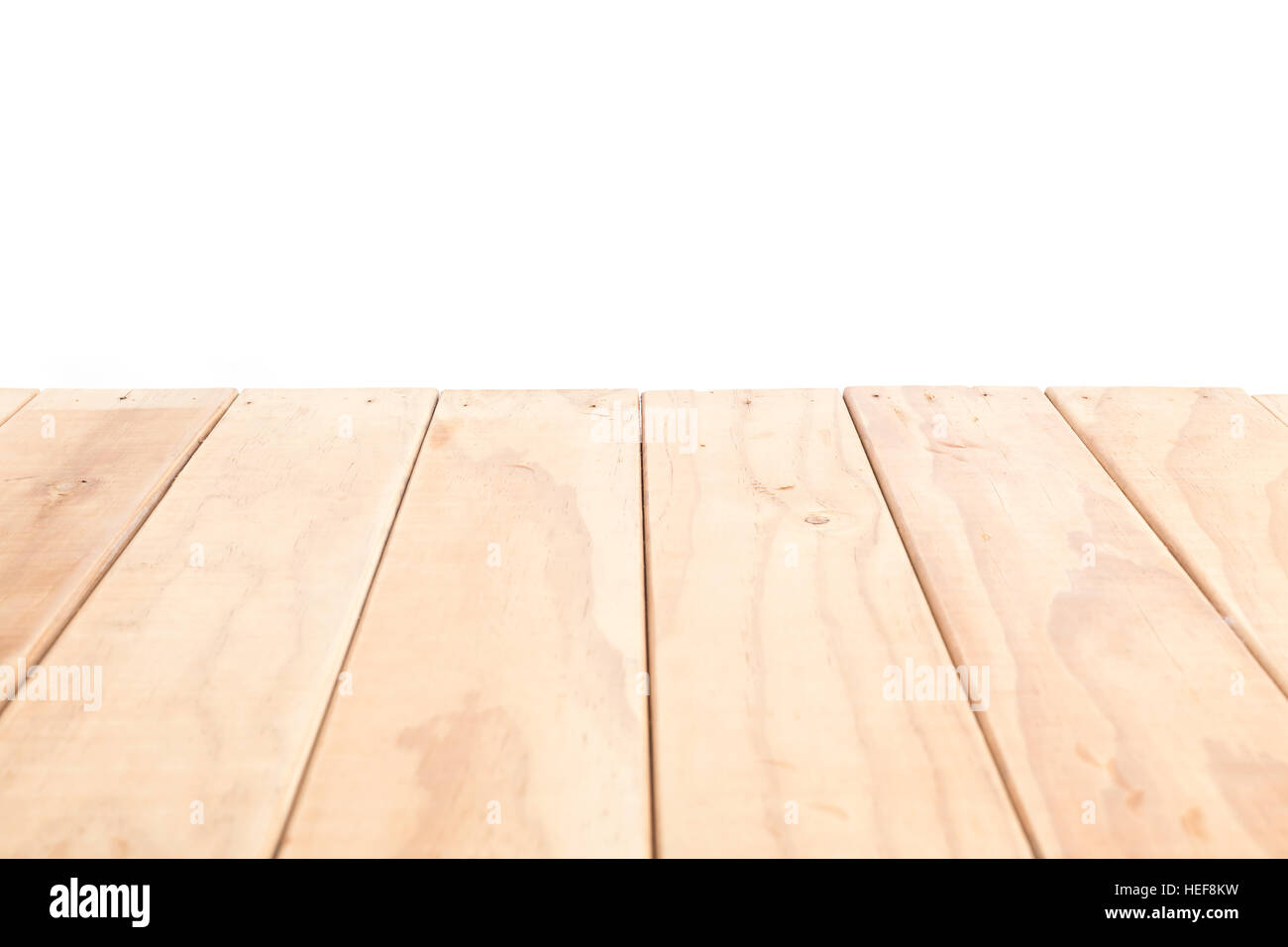 Empty top of wooden table or counter isolated on white background. For ...