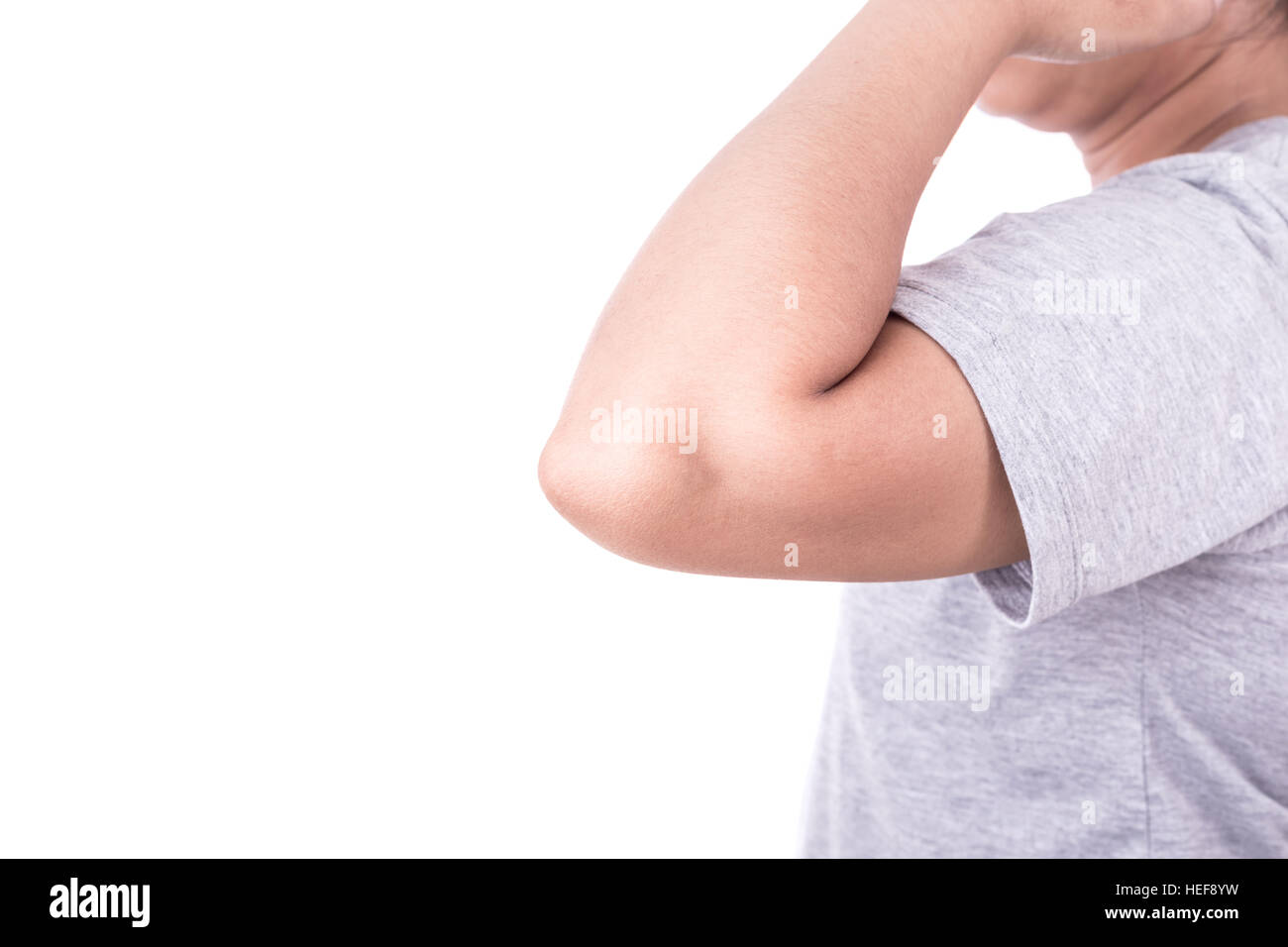Close up woman's hand holding her elbow isolated on white background ...
