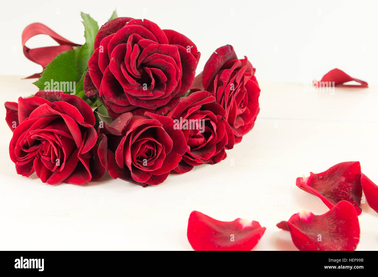 Red rose flower bouquet on white background Stock Photo - Alamy