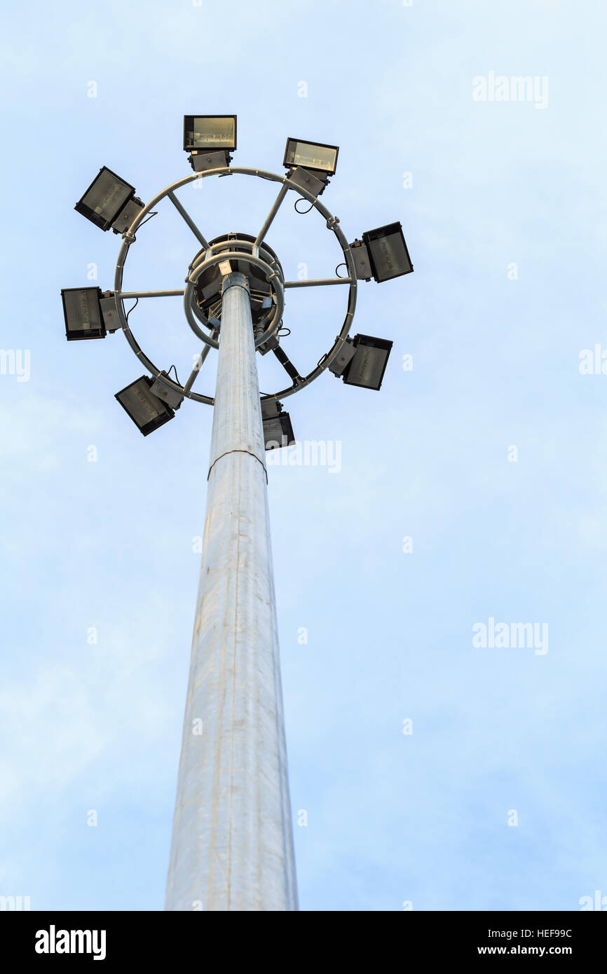 Spot-light tower at the road on blue sky background Stock Photo - Alamy