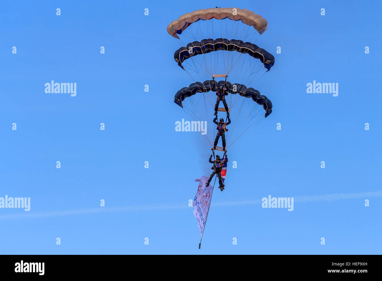 Three of the Tigers Freefall ParachuteTeam members stacked as they ...
