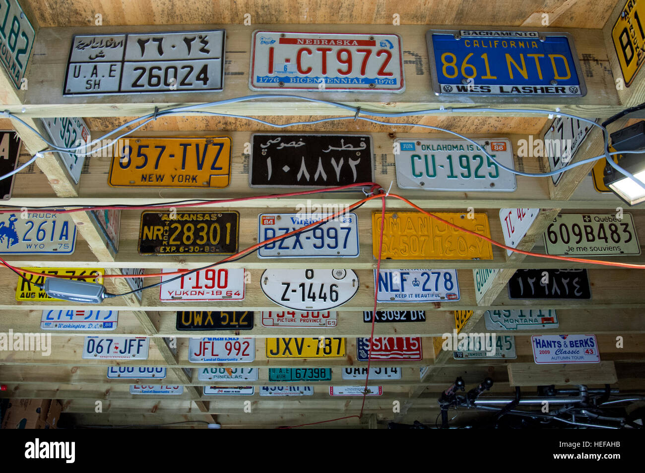 Collection of car number or registration plates in a garage roof Stock ...