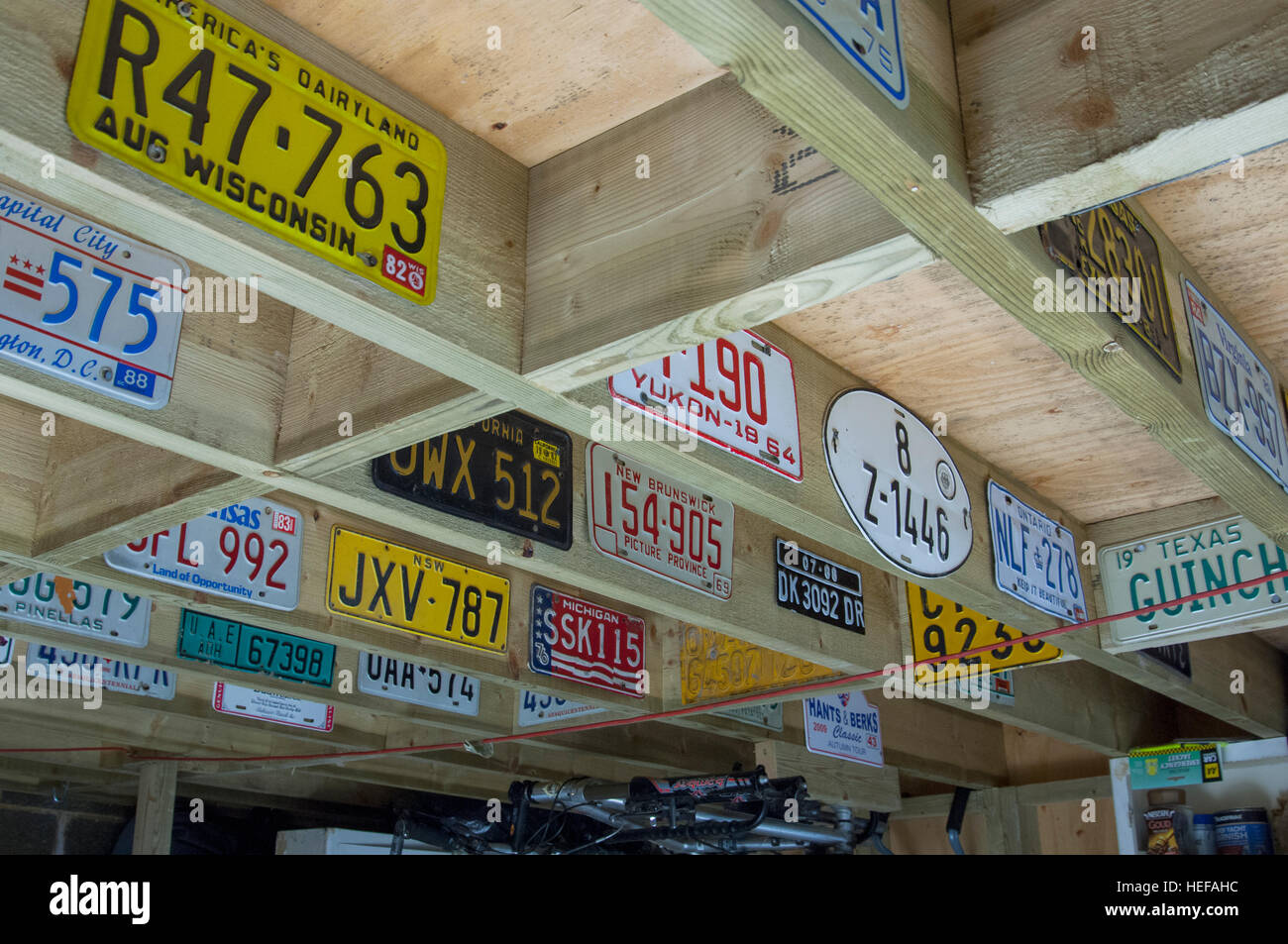 Collection of car number or registration plates in a garage roof Stock ...
