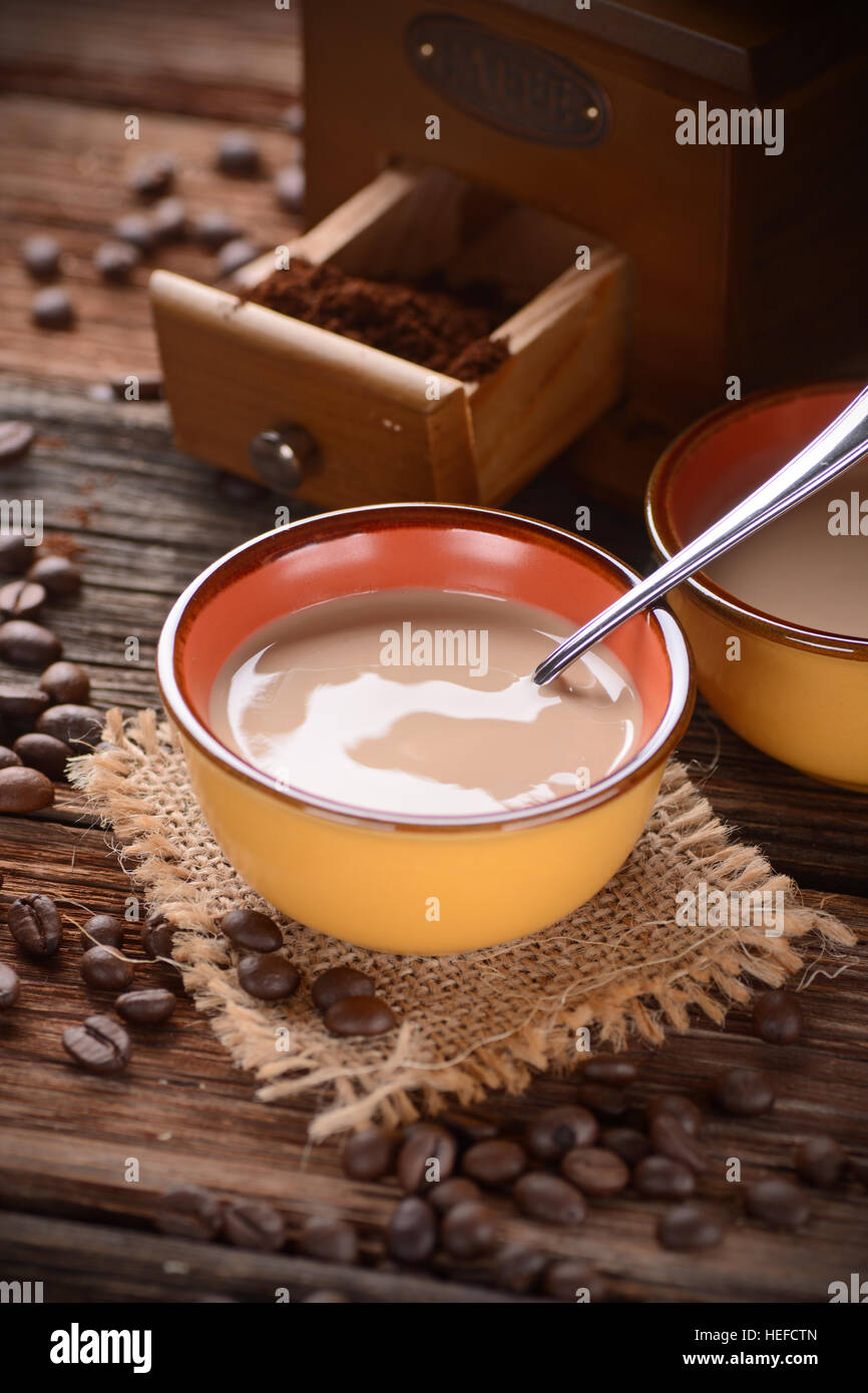 yogurt flavored coffee with ingredients around Stock Photo - Alamy